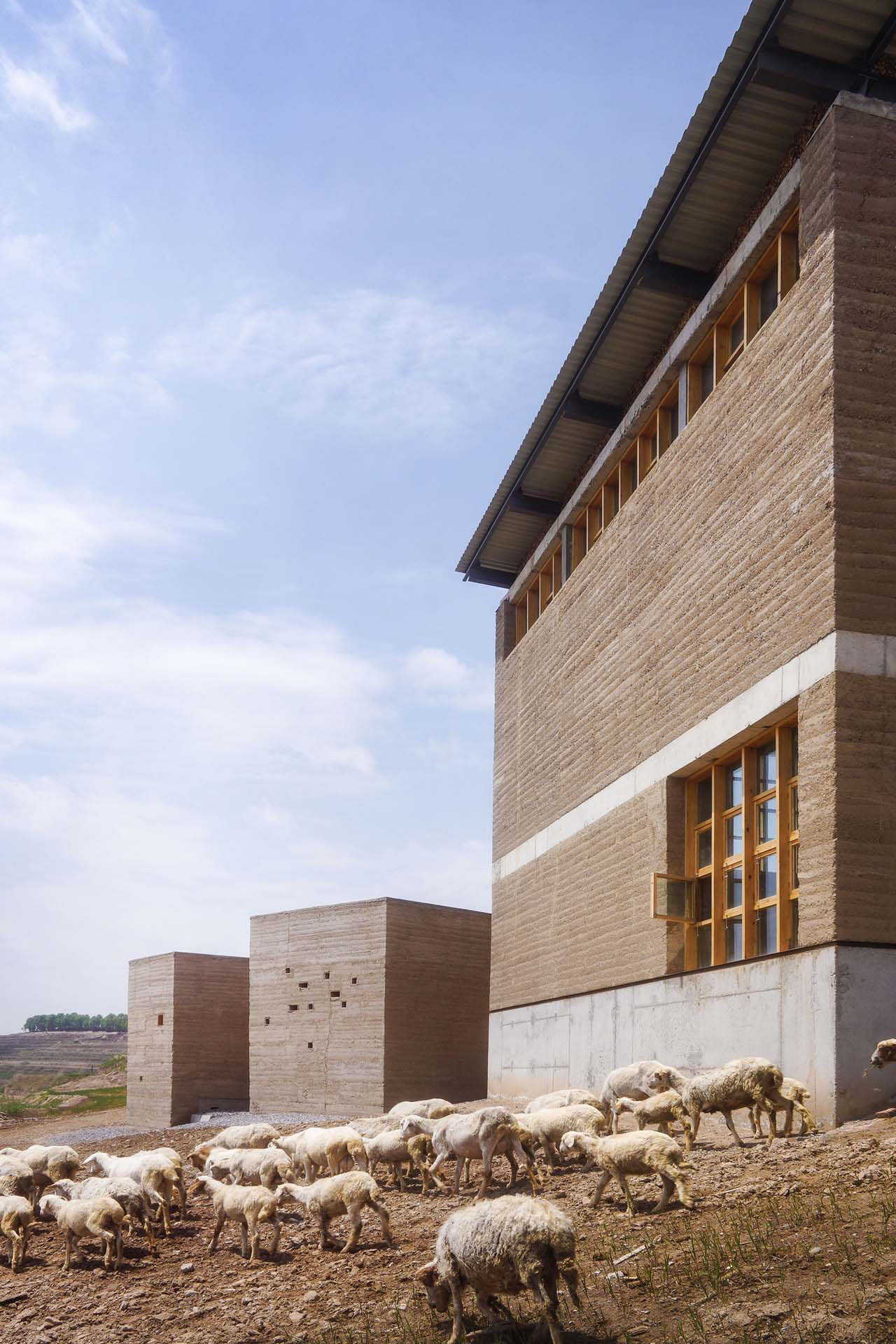 Macha Village Center by ONEARTH Architecture