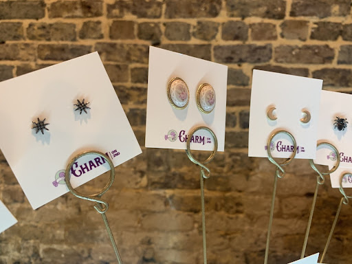 Charm Opens New Downtown Location | About Town