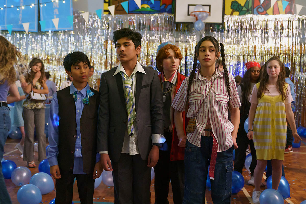 The authentic early 2000s costumes in ‘Raised by Refugees’ | Ensemble ...