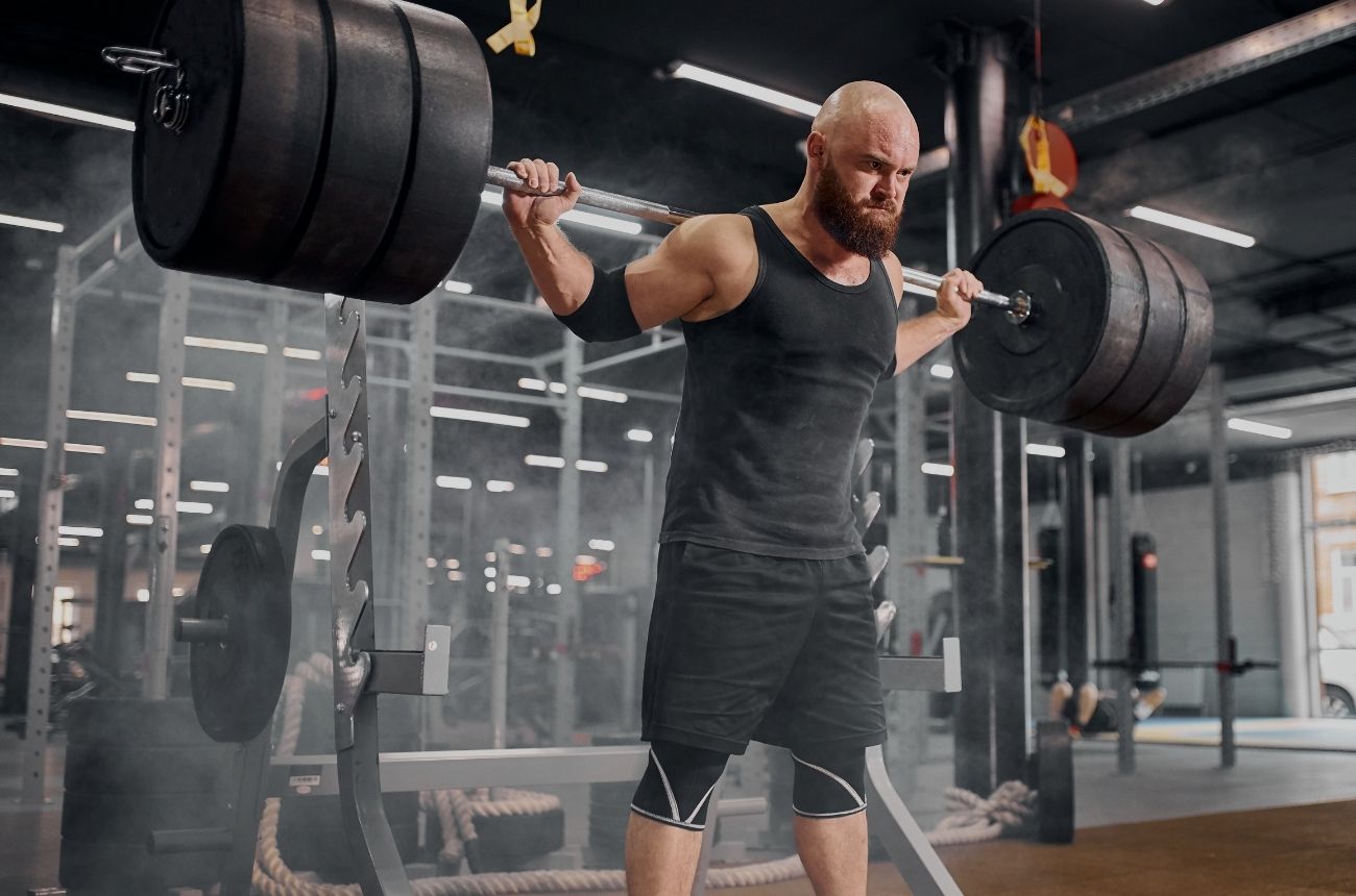 Best Powerlifting Exercises: How to Do It, Benefits & Safety Tips