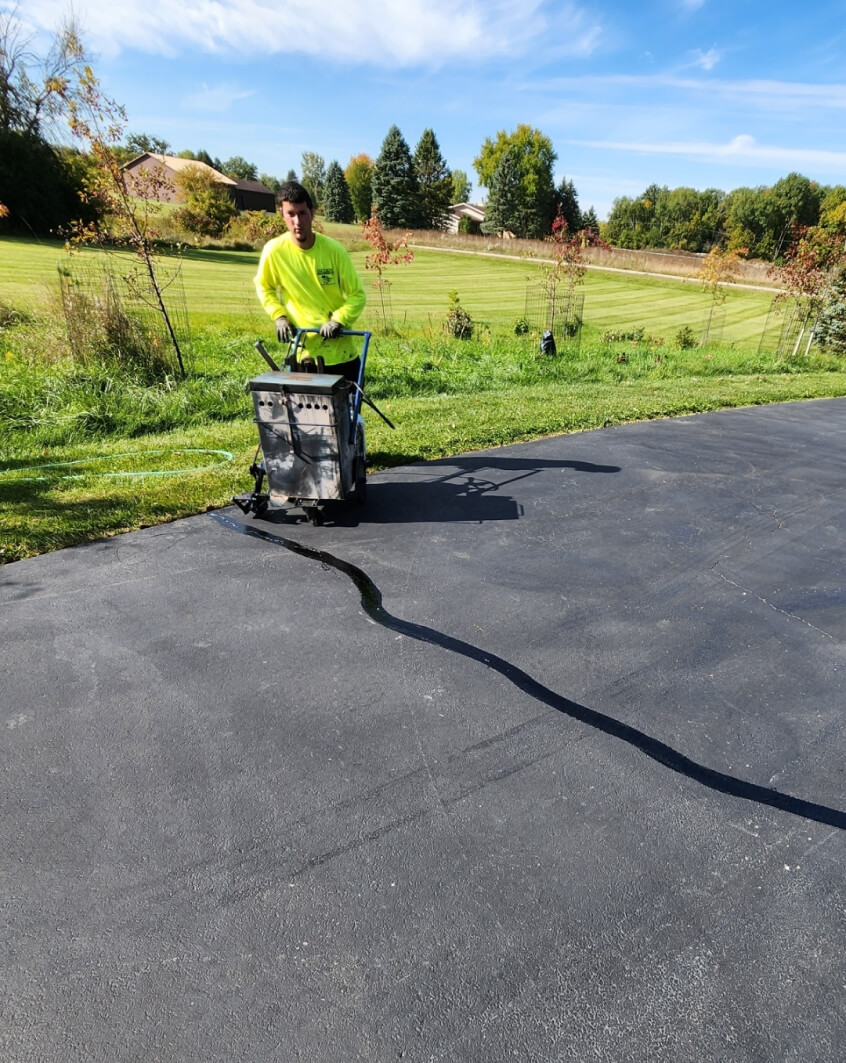 Asphalt Crack Filling In McHenry County, IL | Strictly Sealcoating, INC®