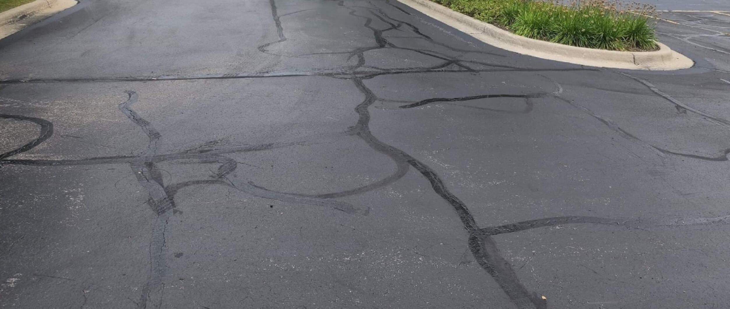 Asphalt Crack Filling In McHenry County, IL | Strictly Sealcoating, INC®