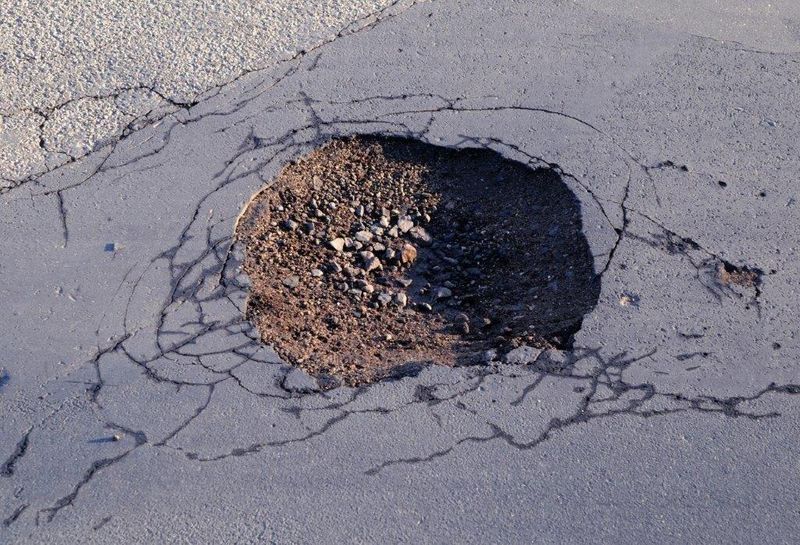 Pothole Repair: Asphalt, Gravel, And Cement Driveways